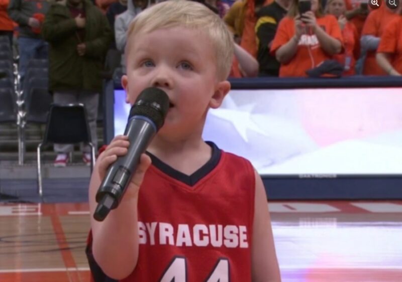 "A three-year-old child sings the national anthem perfectly in front of ...